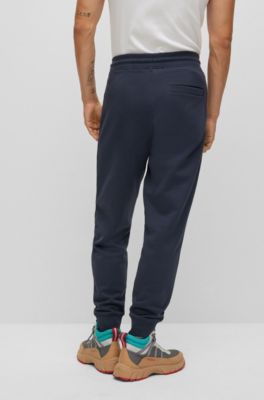 HUGO - Tracksuit-bukser i bomuldsfrotté med rødt logomærkat