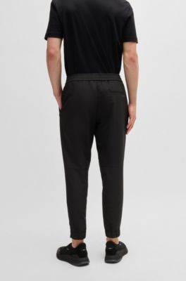 BOSS - Tapered-fit chinos in easy-iron four-way stretch fabric