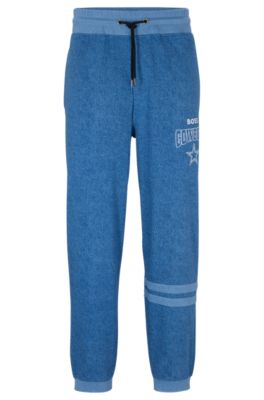 BOSS - BOSS x NFL oversize-fit tracksuit bottoms in denim-look cotton