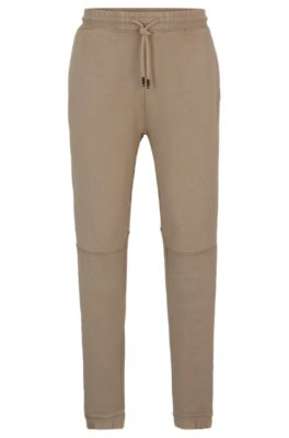 BOSS - Cotton-terry tracksuit bottoms with logo detail - Beige