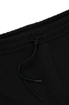 HUGO - Cotton-terry shorts with varsity-style logo - Black