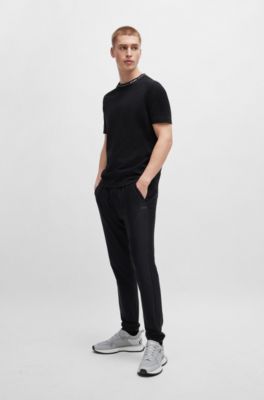 BOSS - T-shirt Regular Fit en jersey de coton avec col logoté - Noir