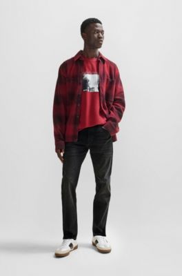 BOSS - Tapered-fit jeans in black super-stretch denim - Dark Grey