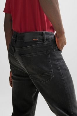 BOSS - Tapered-fit jeans in black super-stretch denim - Dark Grey