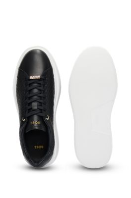 BOSS - Cupsole trainers in leather with embossed monograms - Black