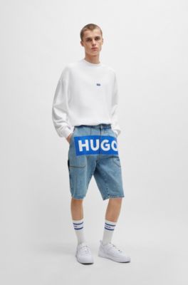 HUGO - Shorts de denim con logo estampado - Azul