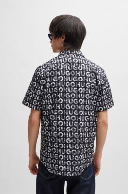 HUGO - Relaxed-fit shirt with seasonal logo print - Patterned