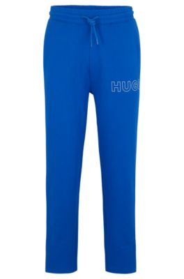 HUGO - Loose-fit cotton-terry tracksuit bottoms with outline logo - Blue