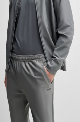 BOSS - Tracksuit bottoms in stretch fabric with decorative reflective ...