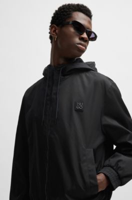 HUGO - Water-repellent hooded jacket with stacked-logo trim - Black