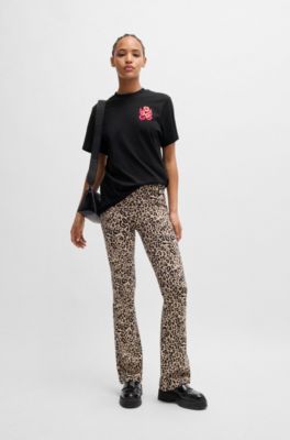 HUGO - Relaxed-fit T-shirt in cotton with floral logo artwork - Black