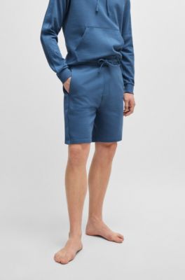 HUGO - Cotton-terry shorts with logo tape side seams - Blue