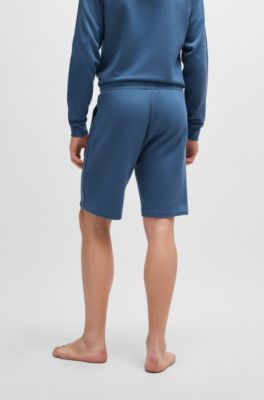 HUGO - Cotton-terry shorts with logo tape side seams - Blue