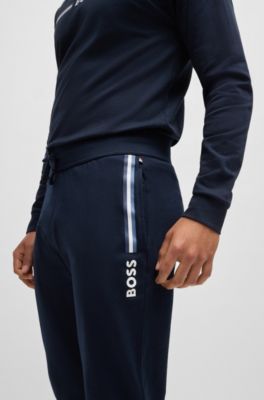 BOSS - Tracksuit bottoms in French terry cotton with logo detail - Dark ...