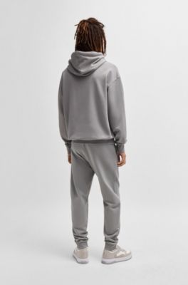 HUGO - Cotton-terry tracksuit set with blue logo patches - Light Grey