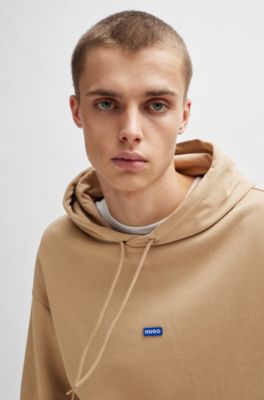 HUGO - Cotton-terry hoodie with blue logo label - Beige