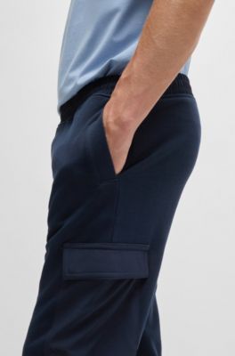 BOSS - Cotton-terry tracksuit bottoms with cargo pockets - Dark Blue