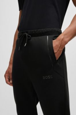 BOSS - Cotton-blend tracksuit bottoms with mirror-effect logo - Black