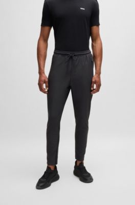 BOSS - Active-stretch tracksuit bottoms with decorative reflective ...