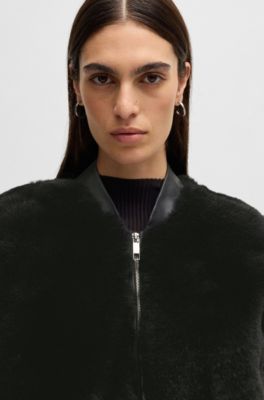 BOSS - Sleeveless shearling jacket with leather trims - Black