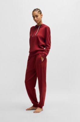 BOSS - Cuffed tracksuit bottoms with signature-stripe drawcord - Dark Red
