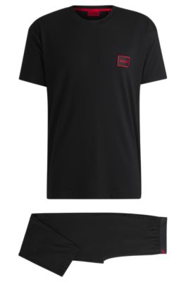 HUGO - Relaxed-fit pyjamas in stretch cotton with logo details - Black