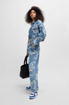 HUGO - Smiley® 페이스 로고 배기 핏 디스트로이드 진