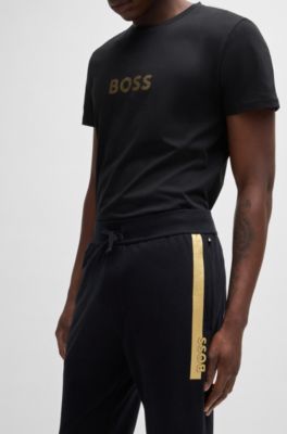 BOSS - Cotton-terry tracksuit bottoms with metallic logo - Black
