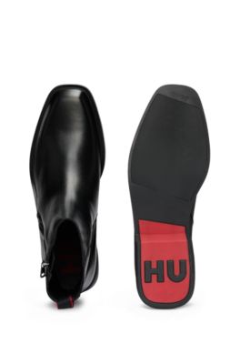 HUGO - Zipped half boots in leather with signature outsole