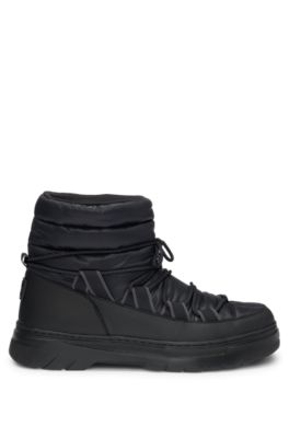 HUGO - Lace-up boots in mixed materials with signature outsole - Black