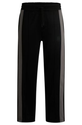 HUGO - HUGO x RB oversized-fit trousers with tape and signature bull ...