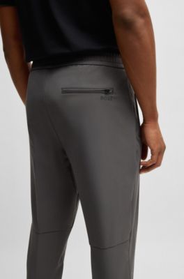 BOSS - Tapered-fit trousers in water-repellent stretch fabric - Dark Grey