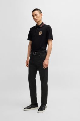 BOSS - Calças de ganga BOSS x Creation of the Gods de ajuste regular ...