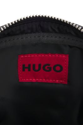HUGO - Faux-leather reporter bag with stacked-logo pattern - Black