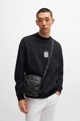 HUGO - Faux-leather reporter bag with stacked-logo pattern - Black