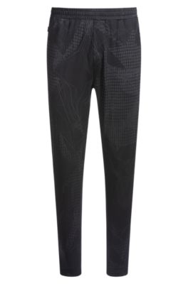 BOSS - Active patterned tracksuit bottoms in four-way stretch fabric ...