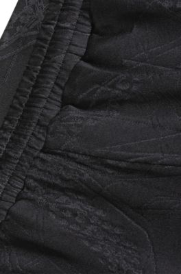 BOSS - Active patterned tracksuit bottoms in four-way stretch fabric ...