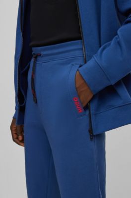 HUGO - Cotton-terry tracksuit bottoms with logo detail - Blue