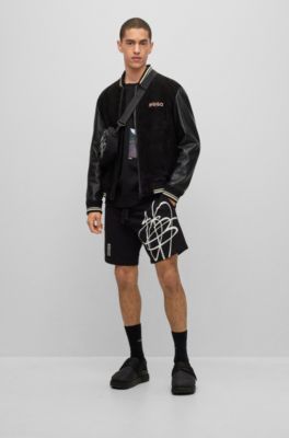 HUGO - Relaxed-fit cotton shorts with graffiti-inspired logo