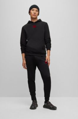 HUGO - Cotton-terry regular-fit hoodie with flock-print logo - Black