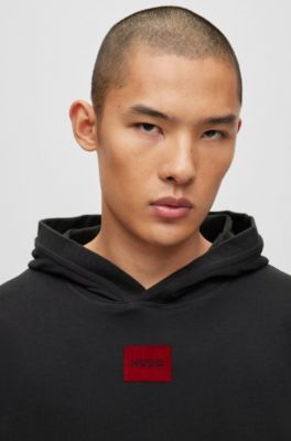 HUGO - Cotton-terry regular-fit hoodie with flock-print logo - Black