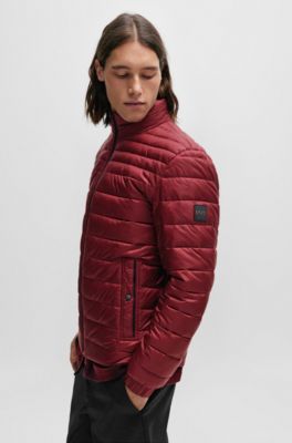 BOSS - Veste matelassée déperlante avec badge logoté - Rouge clair
