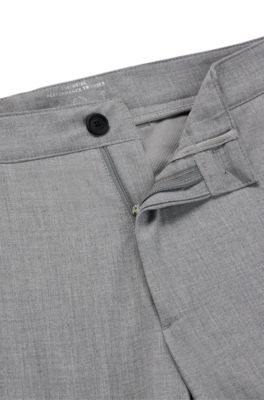 BOSS - Pantalones slim fit de tejido elástico técnico con micromotivo ...