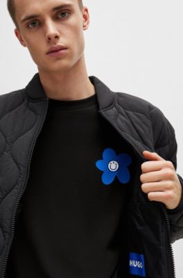 HUGO - Cotton-jersey T-shirt with flower logo artwork - Black