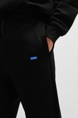 HUGO - Cotton-terry tracksuit with blue logo patches