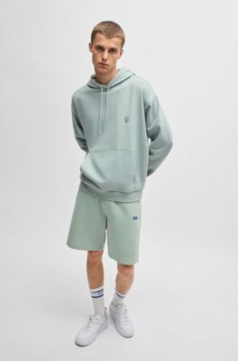 HUGO - Cotton-terry hoodie with Happy HUGO logo - Light Green