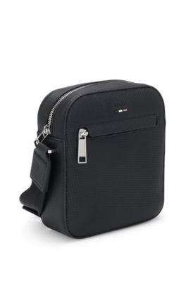 BOSS - Reporter bag in faux leather with monogram-embossed panels - Black